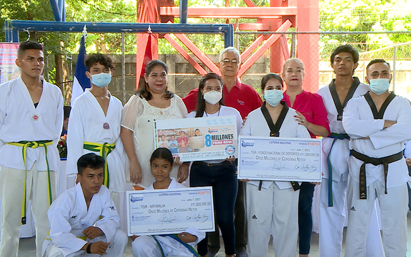 Lotería Nacional entrega 11 millones a Mifam y al IND para programas ...